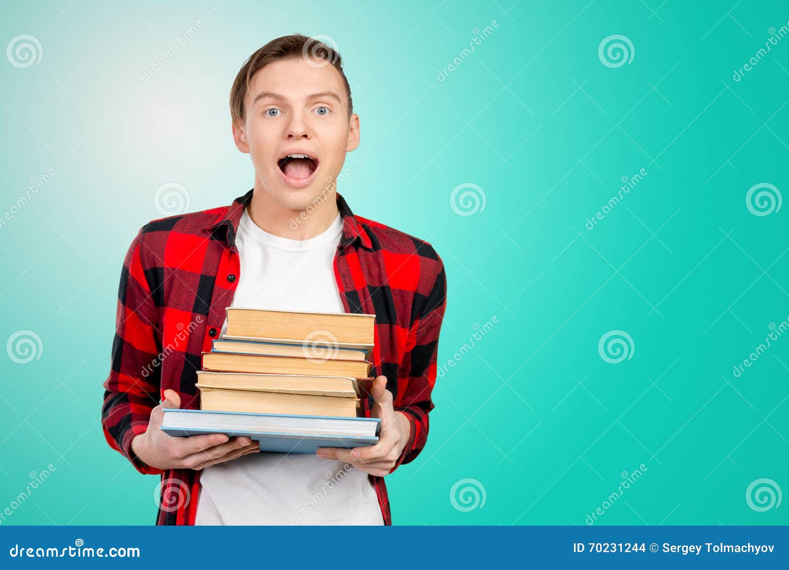 Man holding books stock photo. Image of casual, exam - 70231244