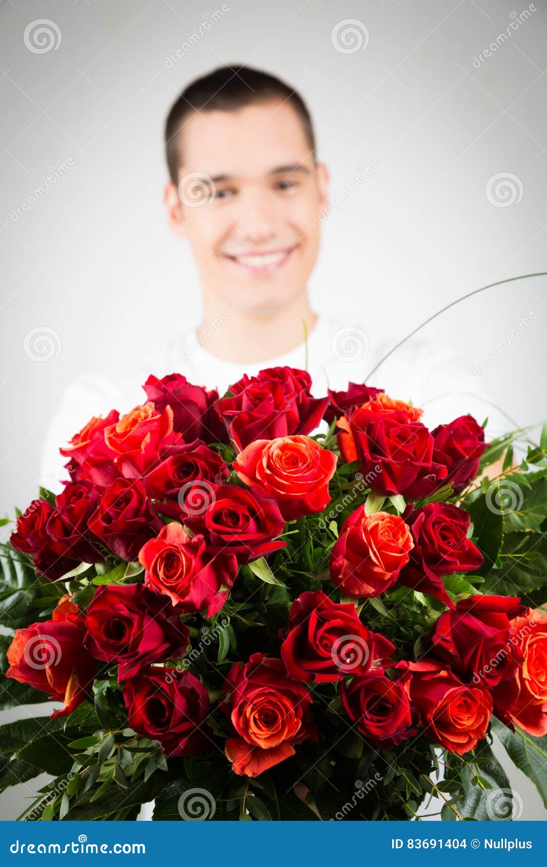 Man Holding Bouquet of Roses Stock Photo - Image of valentine, flower ...