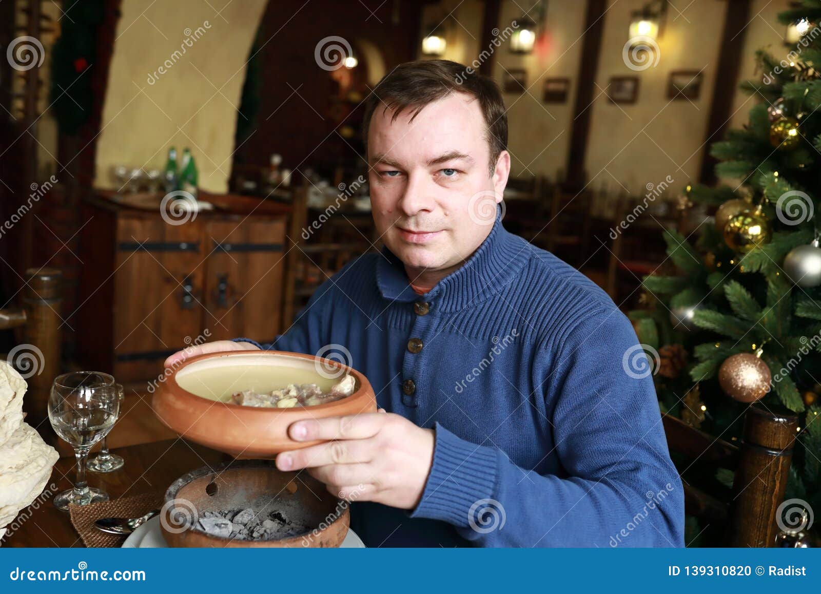 Man Holding Bowl with Khash Stock Photo - Image of indoor, appetizer ...