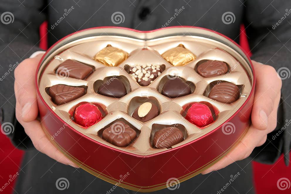 Man Holding Box of Candy stock photo. Image of human, holiday - 461148