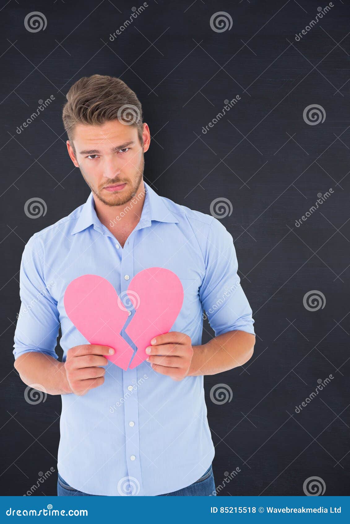 Man holding broken heart stock photo. Image of composite - 85215518