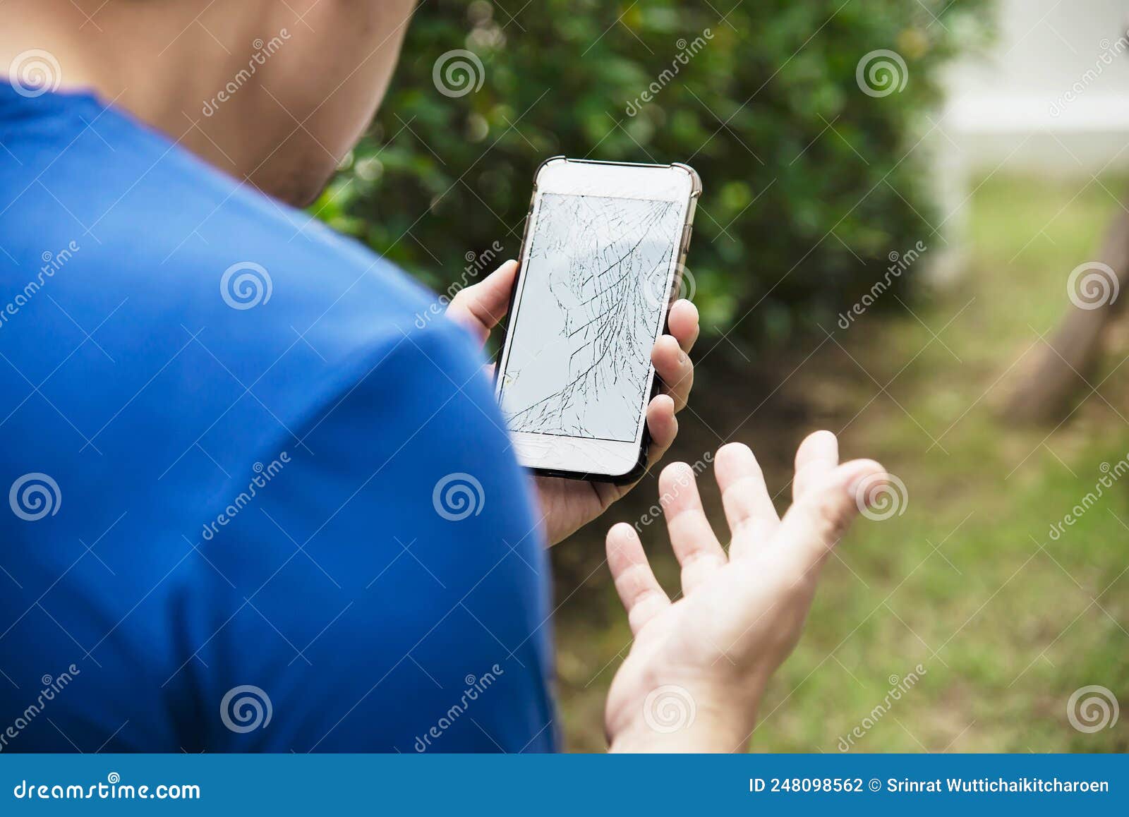 Man holding broken mobile stock photo. Image of mobile - 248098562