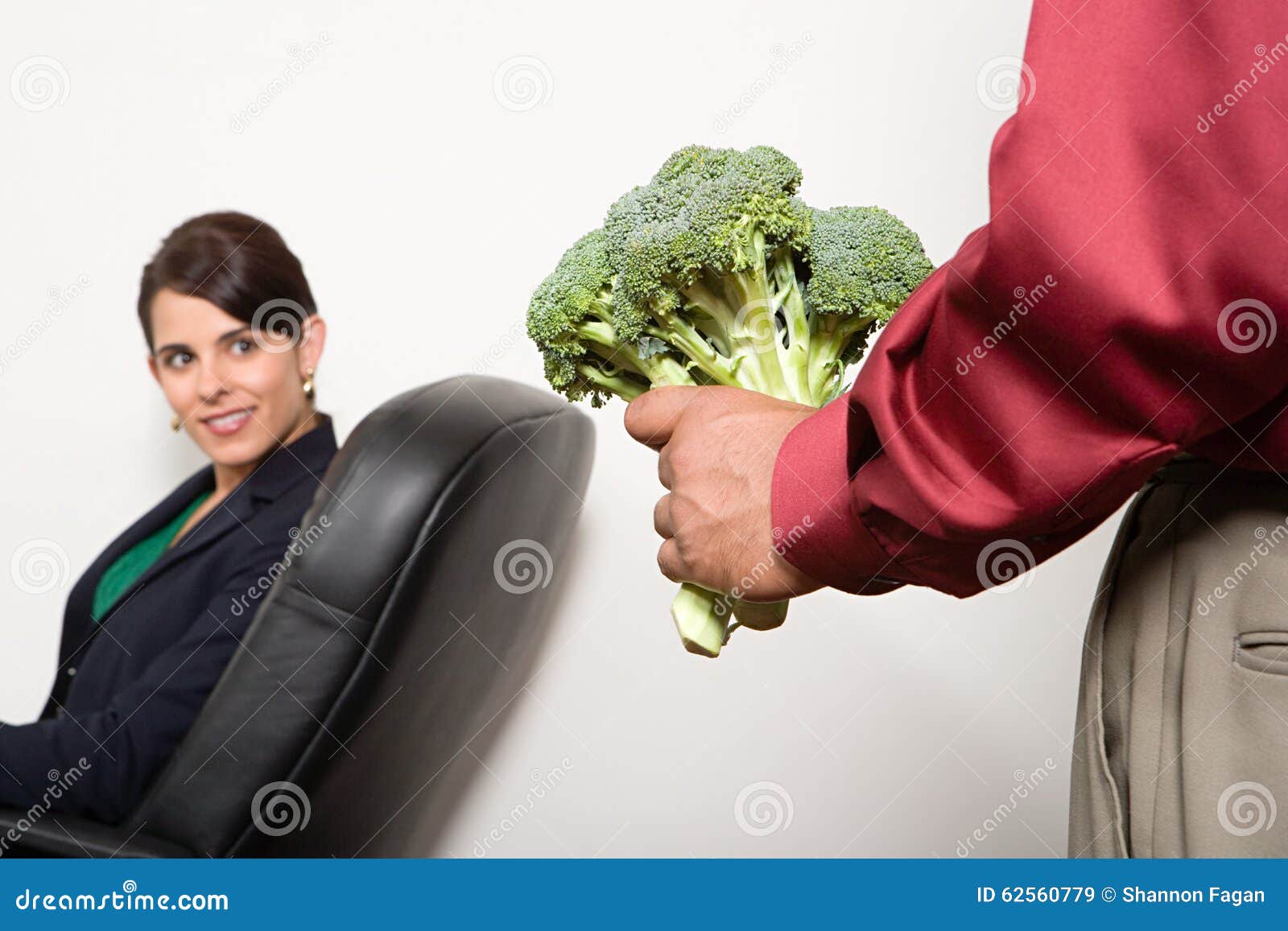 Man Holding a Bunch of Broccoli Stock Image - Image of adult, green ...