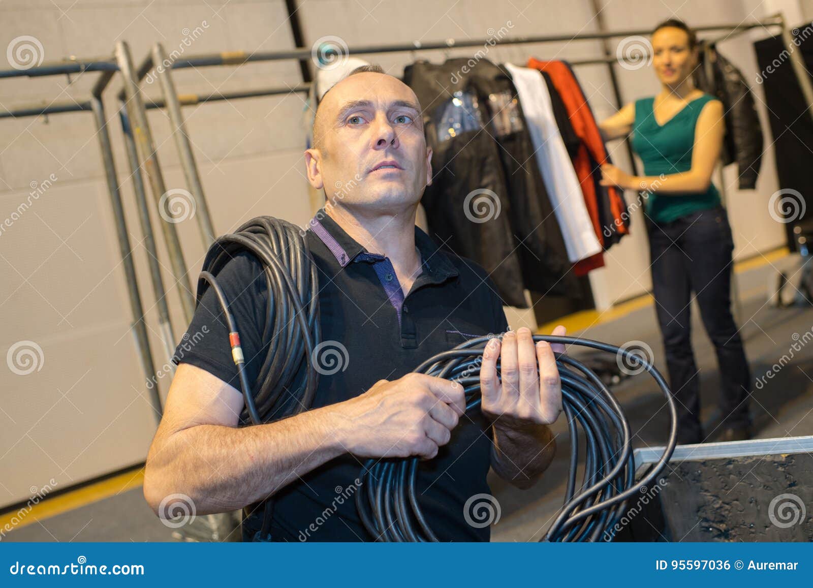 Man holding bunch cables stock photo. Image of center - 95597036