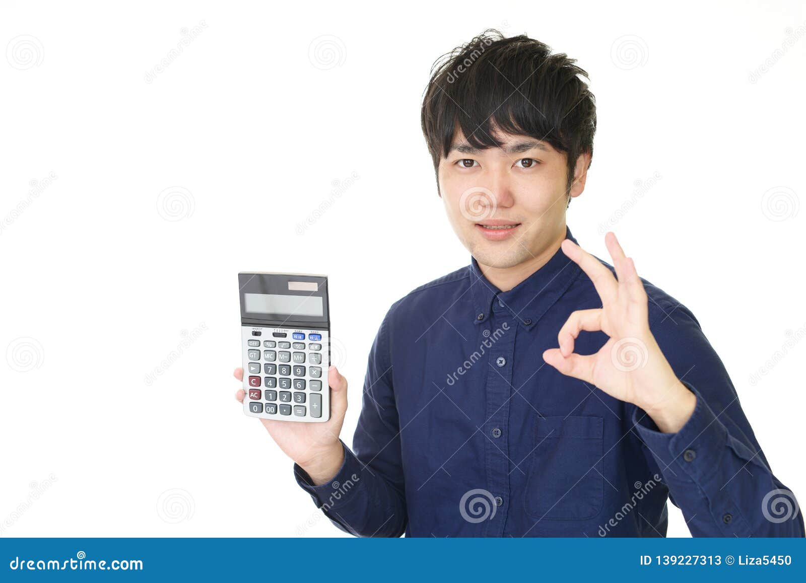 Man holding a calculator stock image. Image of asian - 139227313