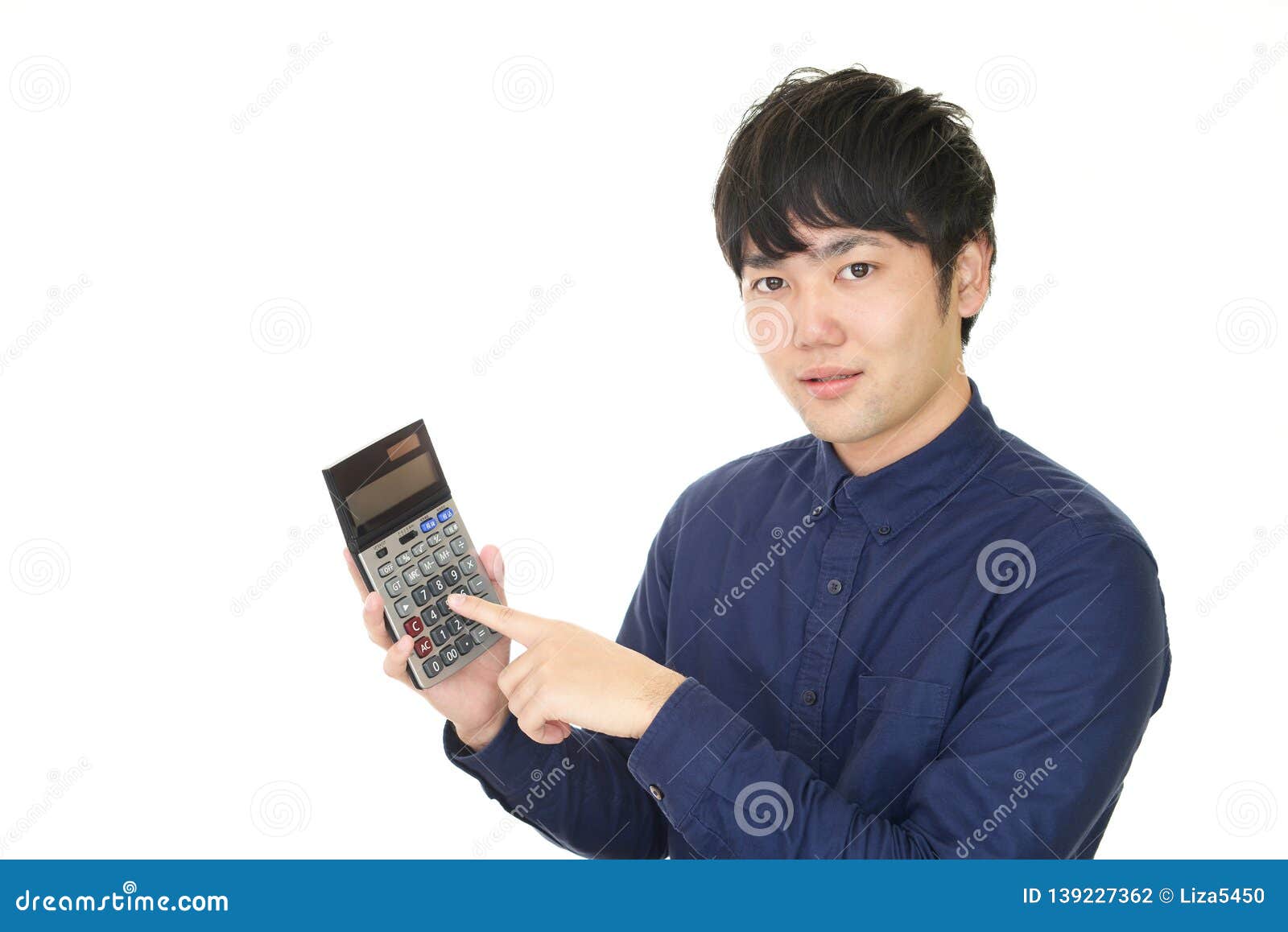 Man holding a calculator stock photo. Image of attractive - 139227362