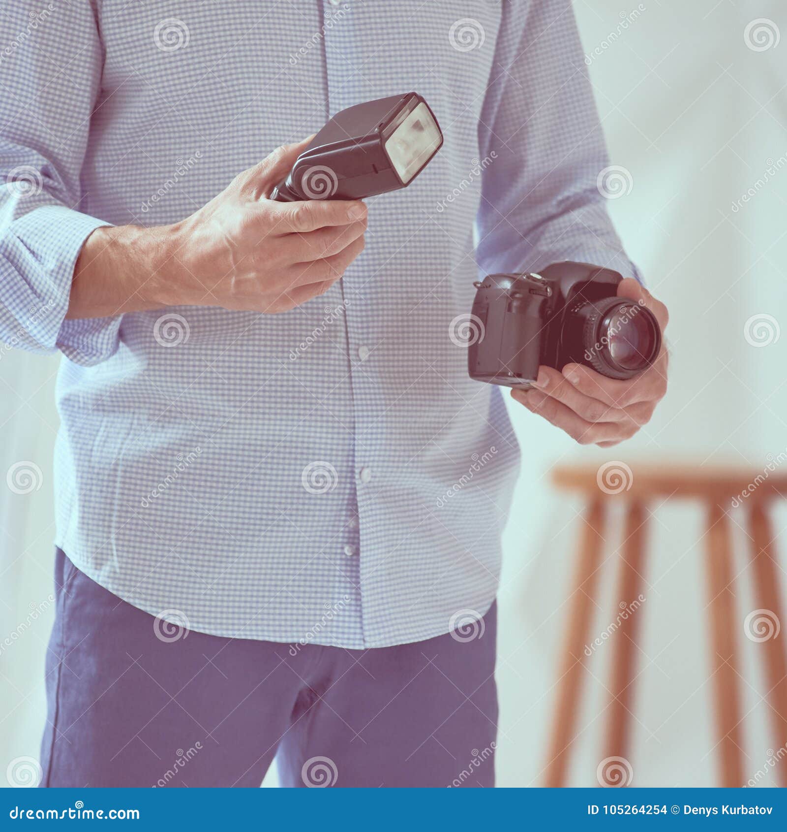 Man Holding Camera and Flash Stock Photo - Image of equipment, portrait ...
