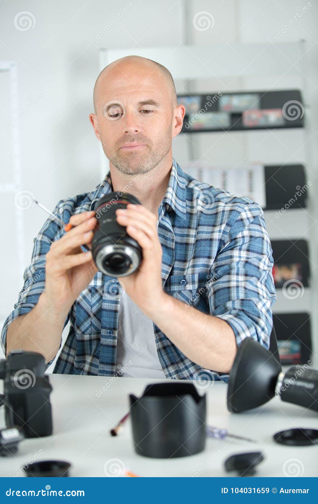Man holding camera lens stock image. Image of amateur - 104031659