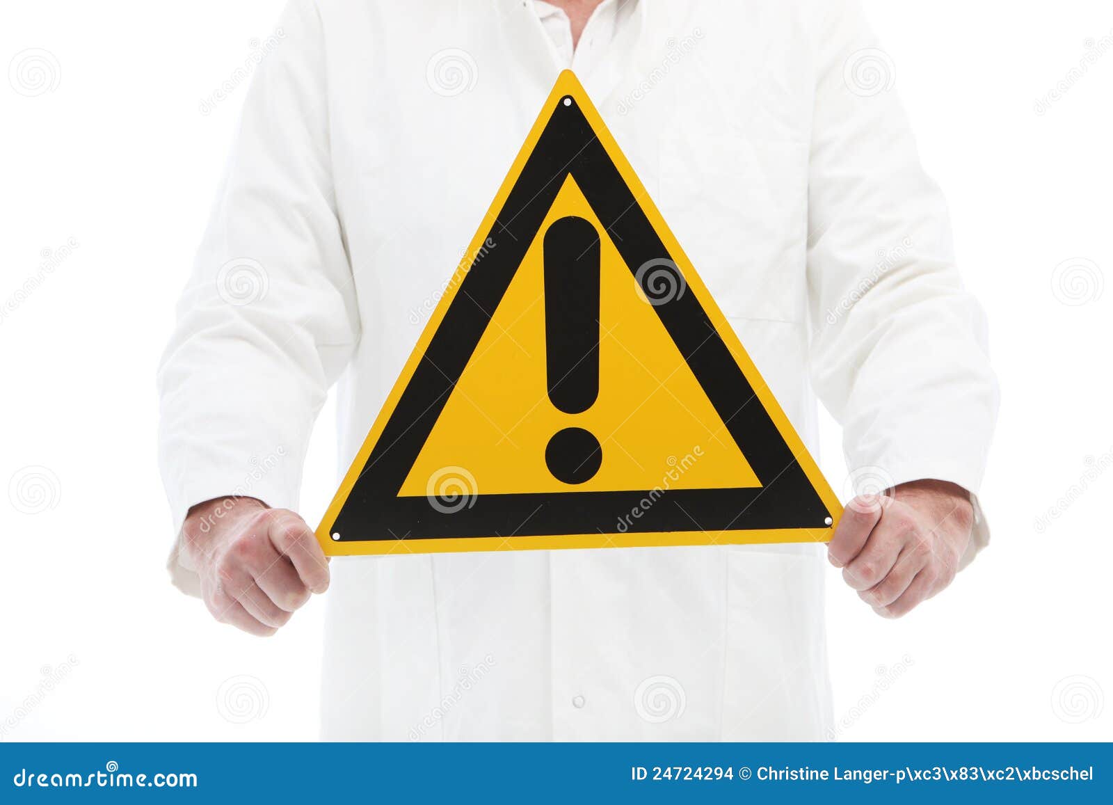 Man Holding a Caution Sign with Exclamation Point Stock Photo - Image ...