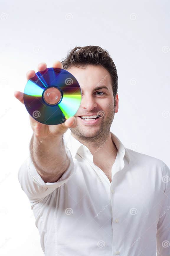 Man holding a cd stock photo. Image of shirt, technology - 17083732