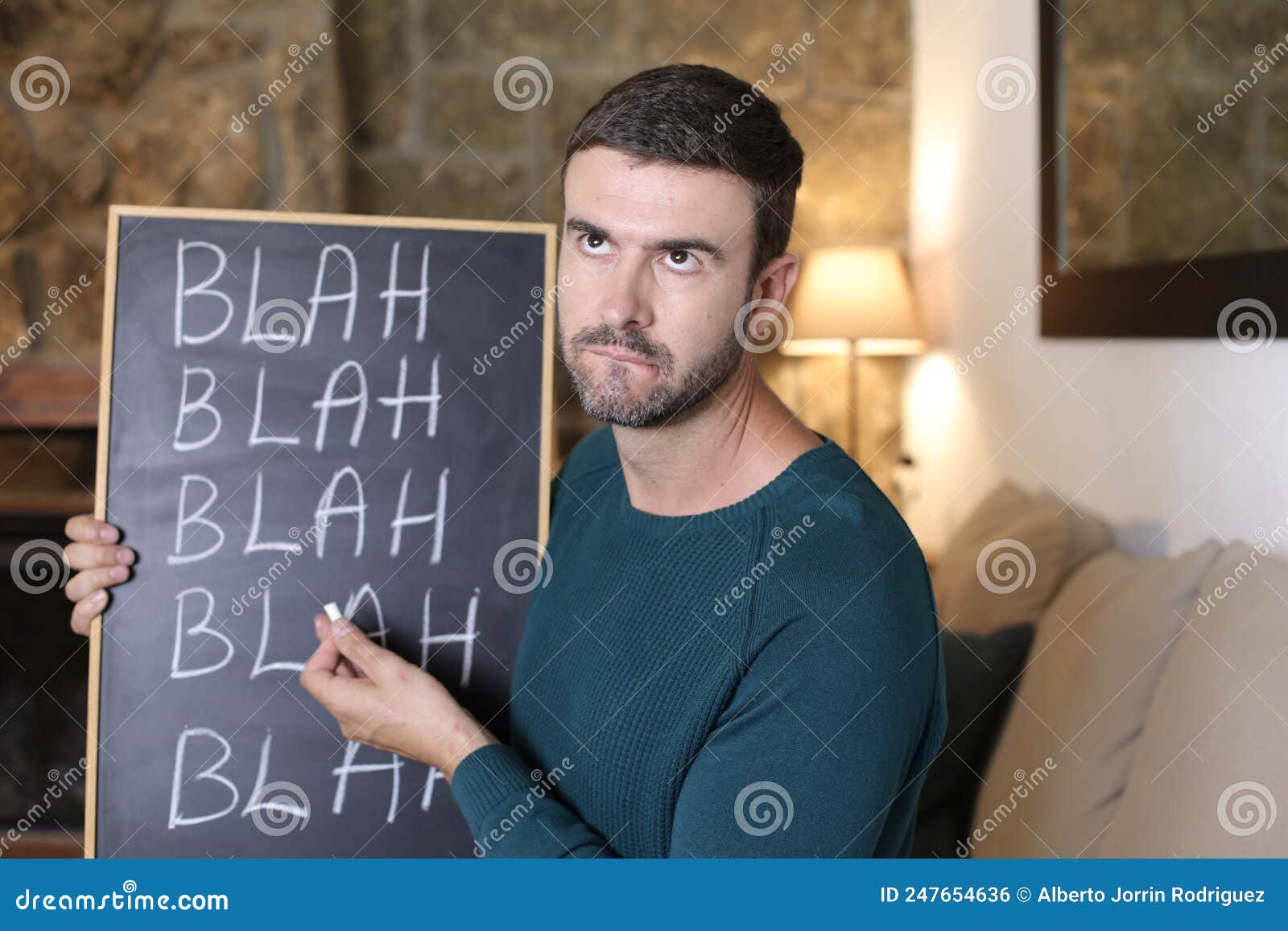 Man Holding Chalkboard with `blah Blah Blah` Hand Written Stock Photo ... Man Holding Chalkboard with `blah Blah Blah` Hand Written Stock Photo ...