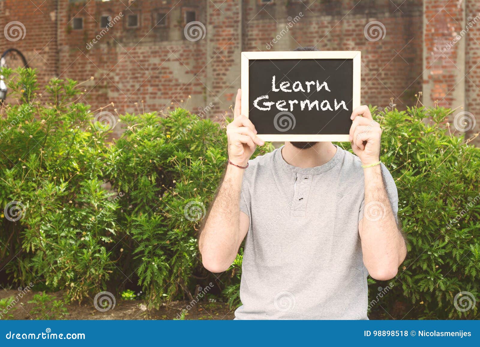 Man Holding Chalkboard with Text Stock Photo - Image of classroom ... Man Holding Chalkboard with Text Stock Photo - Image of classroom ...