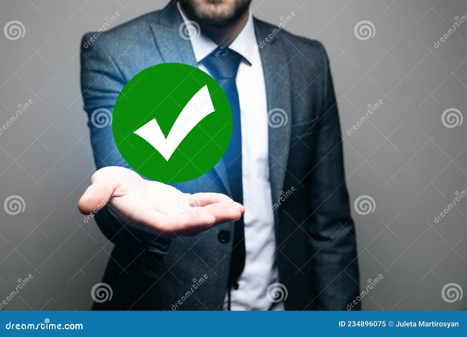 Man Holding a Check Mark Icon in His Hand Stock Image - Image of ...