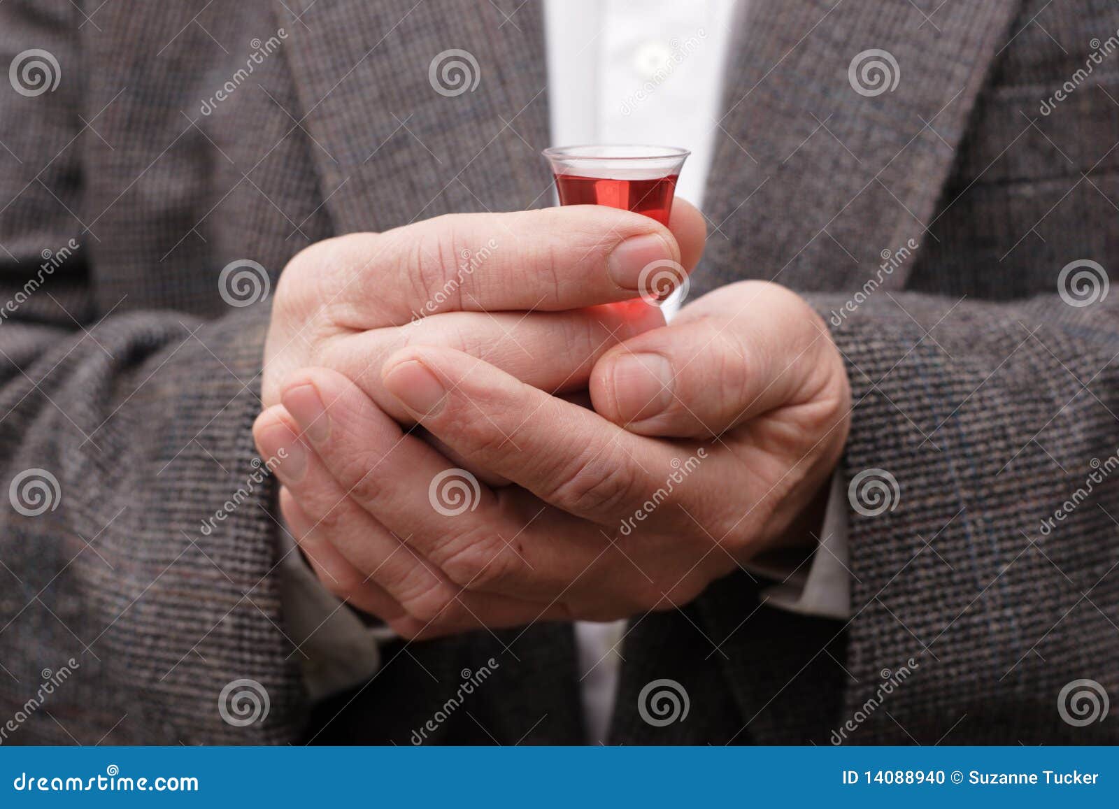 Man holding communion cup stock photo. Image of life - 14088940