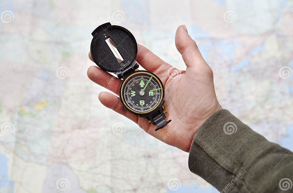 Man holding Compass stock photo. Image of journey, cartography - 20010832