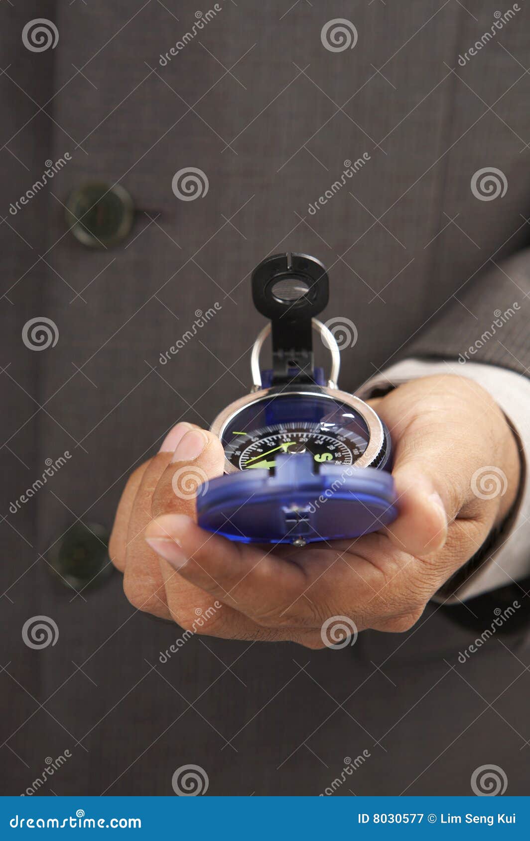 Man holding compass stock image. Image of direction, asian - 8030577