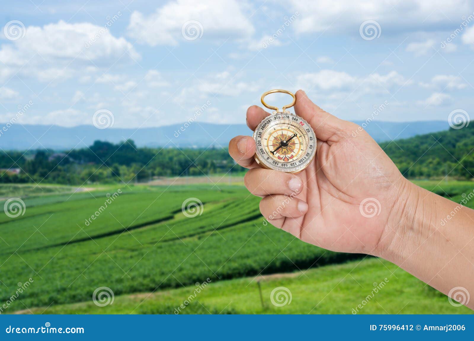 Man holding compass stock photo. Image of exploration - 75996412