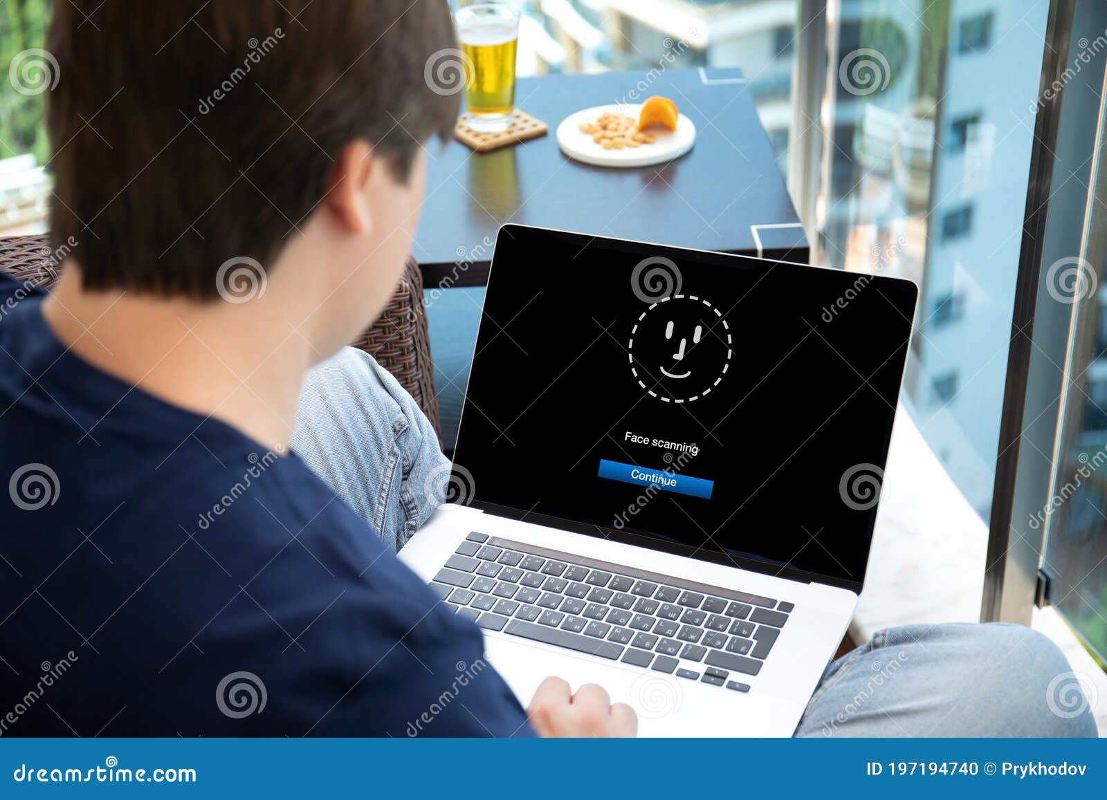 Man Holding Computer Laptop with Face Scanning Application on Screen ...