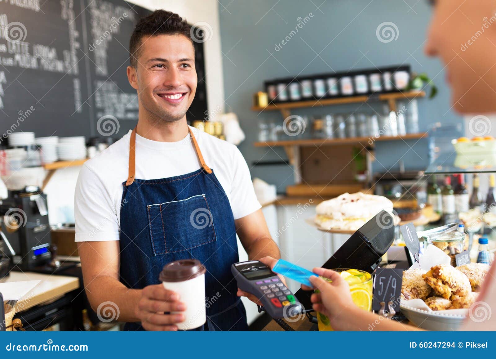 Man Holding Credit Card Reader at Cafe Stock Photo - Image of industry ...