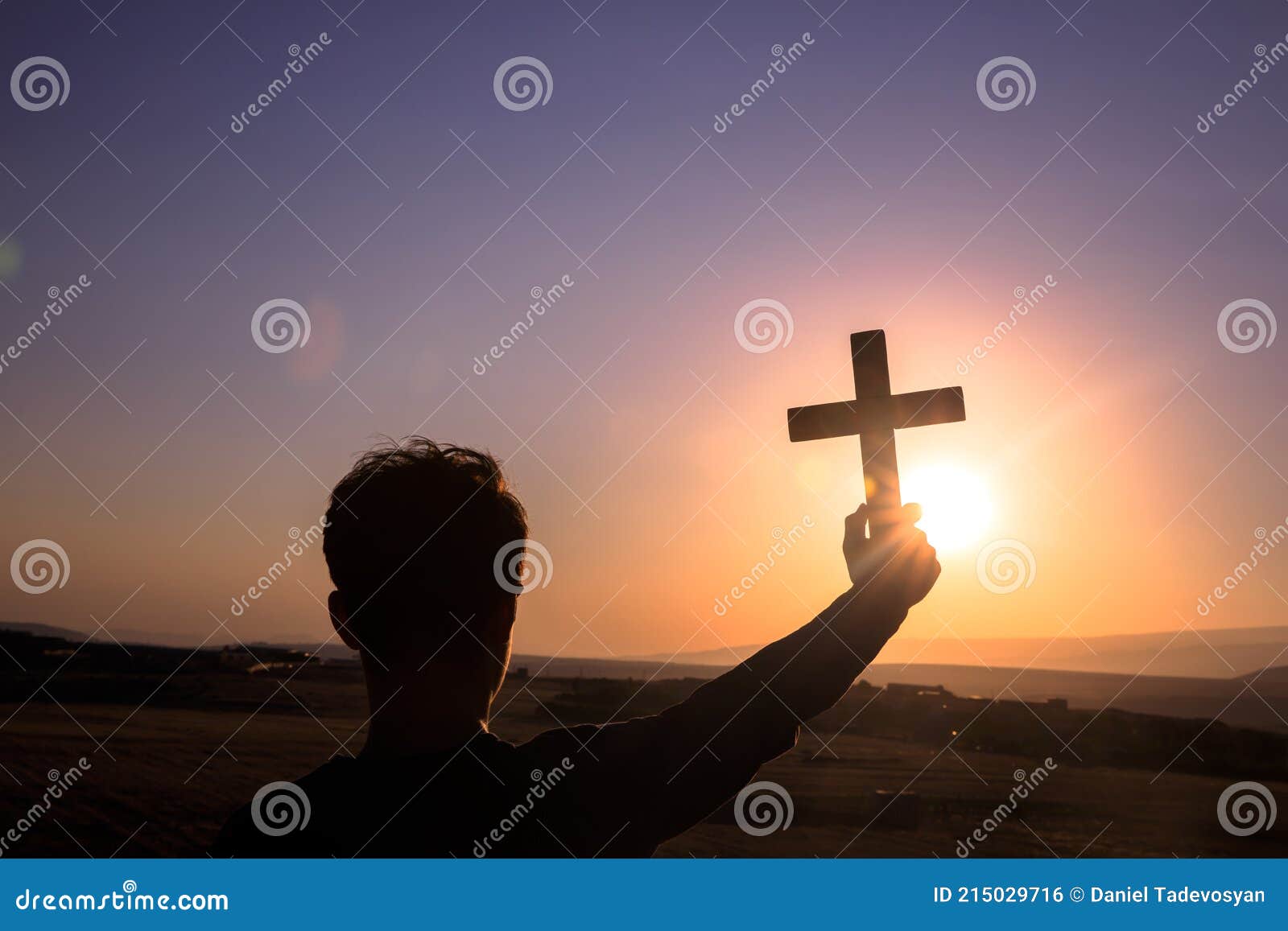 Man holding cross stock photo. Image of crucifix, peace - 215029716