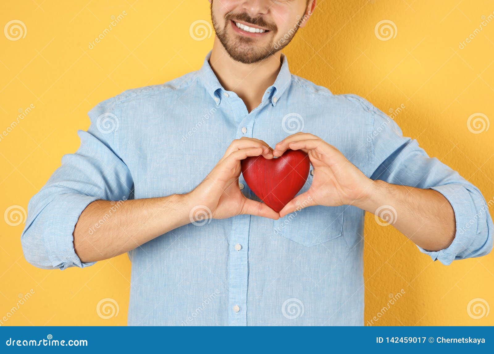 Man Holding Decorative Heart on Color Background Stock Image - Image of ...
