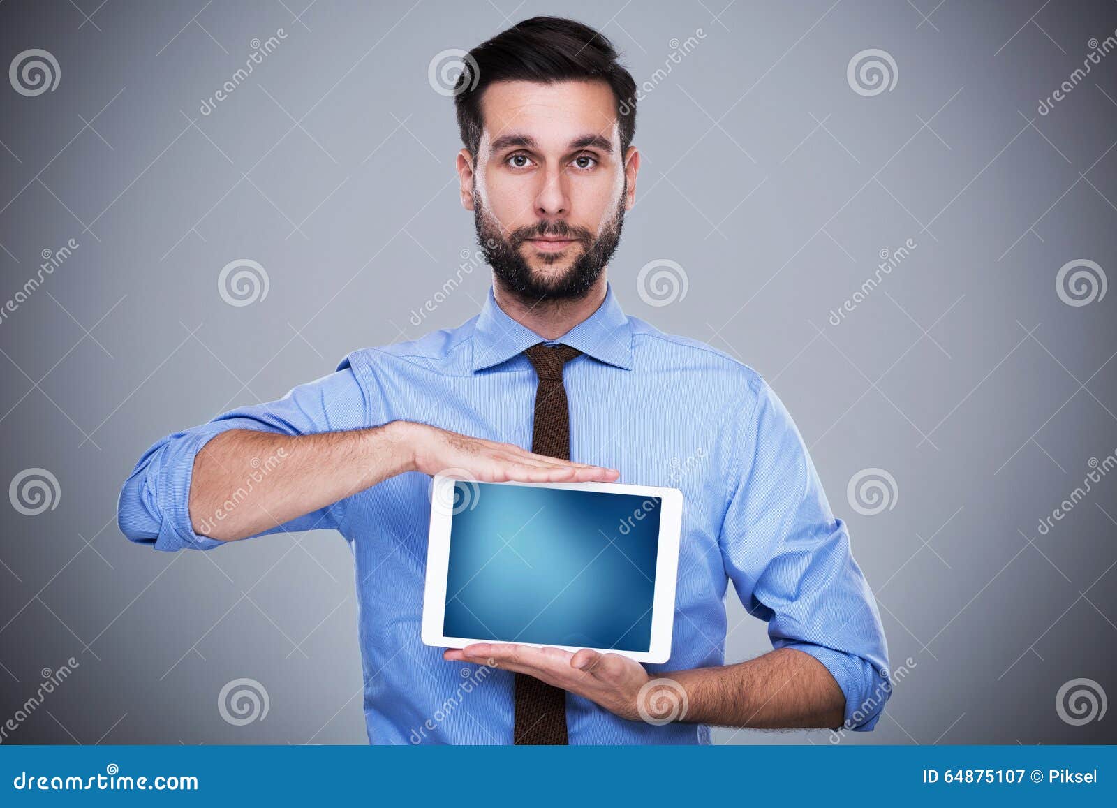 Man holding digital tablet stock image. Image of male - 64875107