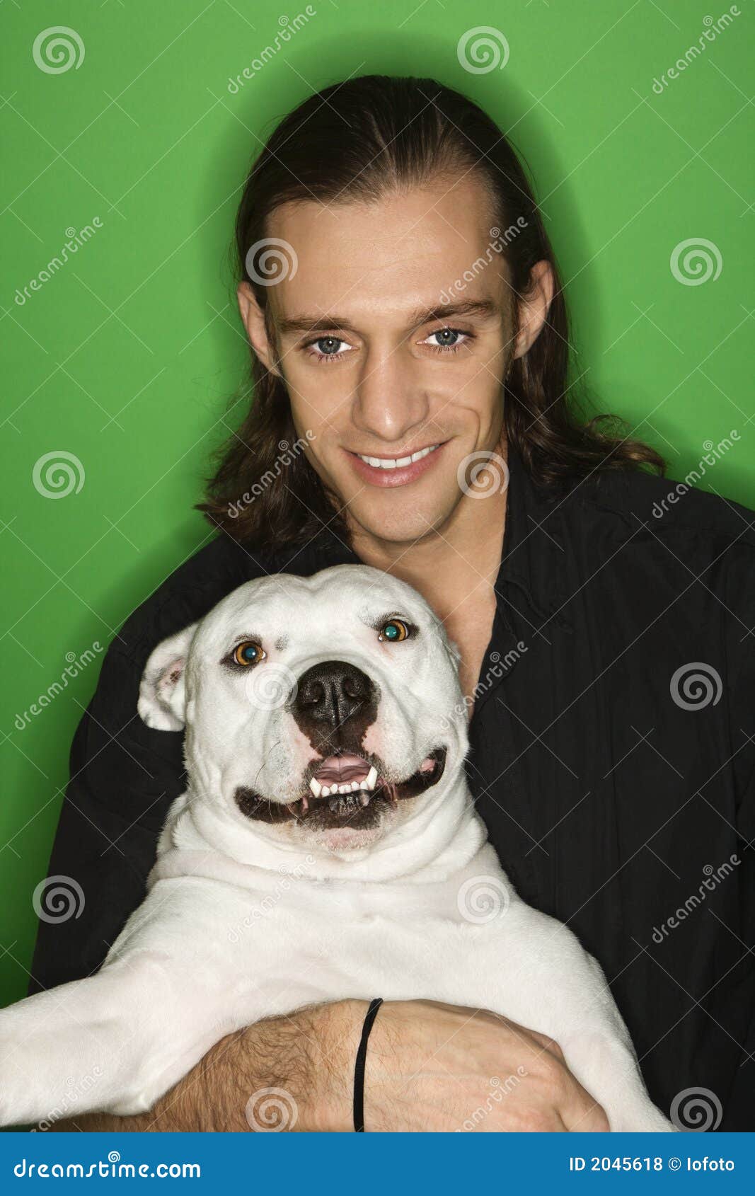 Man holding dog. stock photo. Image of animal, adult, leisure - 2045618