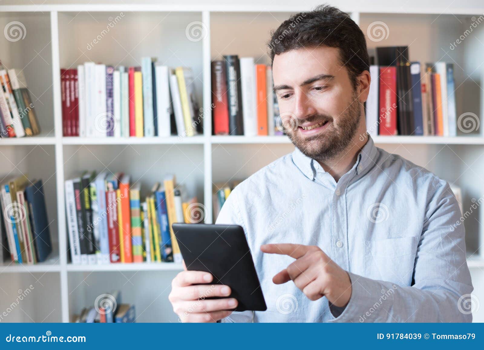 Man Holding an E-book Reader in Hands Stock Image - Image of people ...