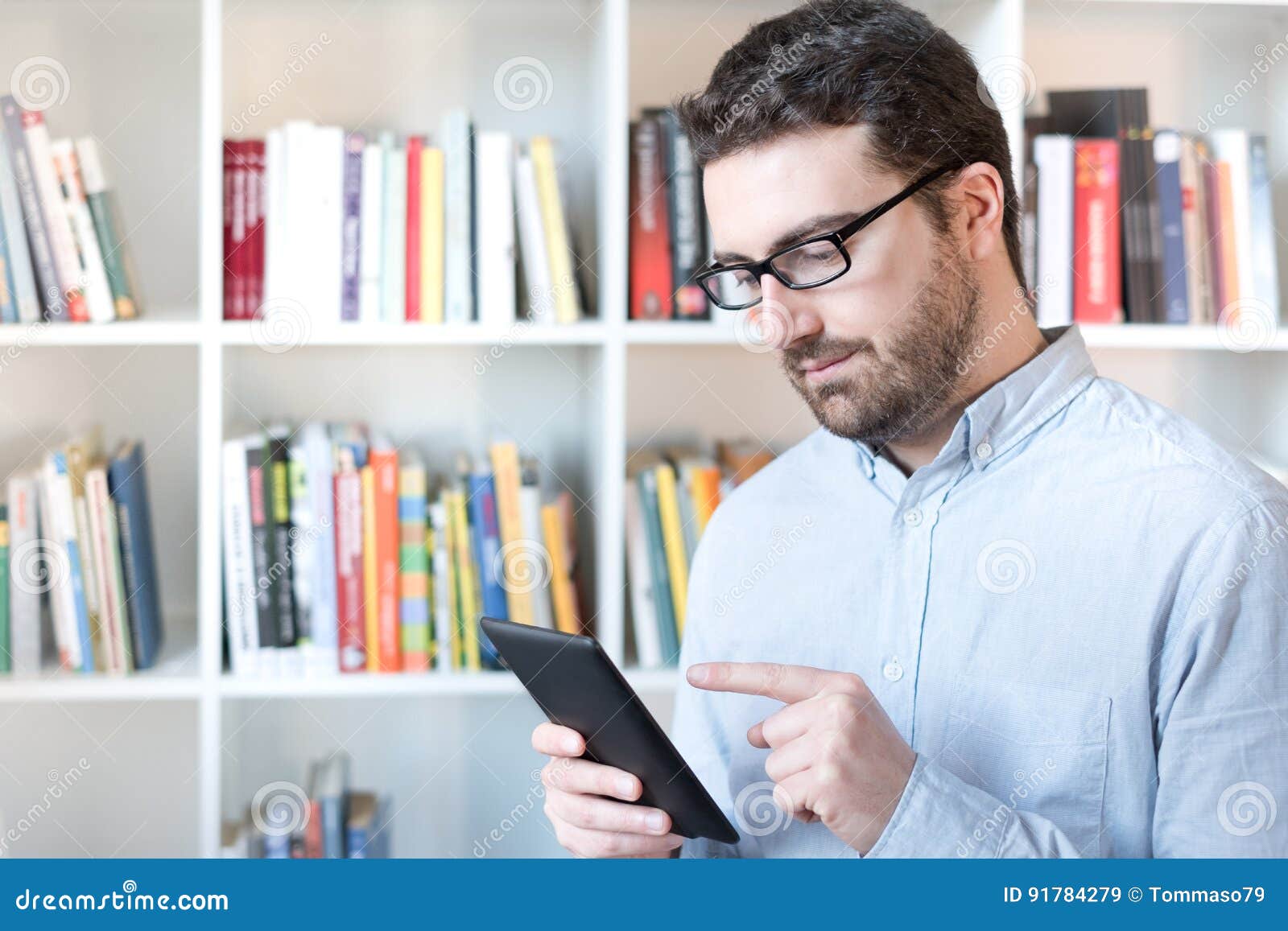 Man Holding an E-book Reader in Hands Stock Image - Image of ...