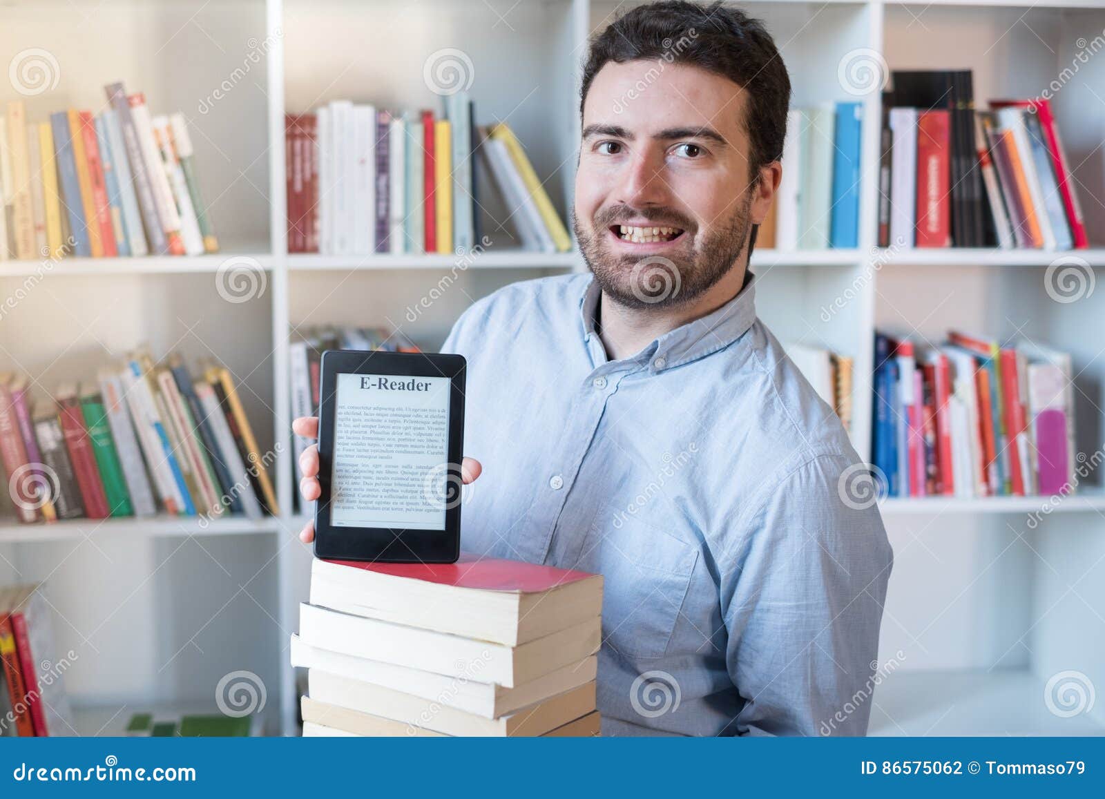 Man Holding an E-book Reader in Hands Stock Photo - Image of caucasian ...