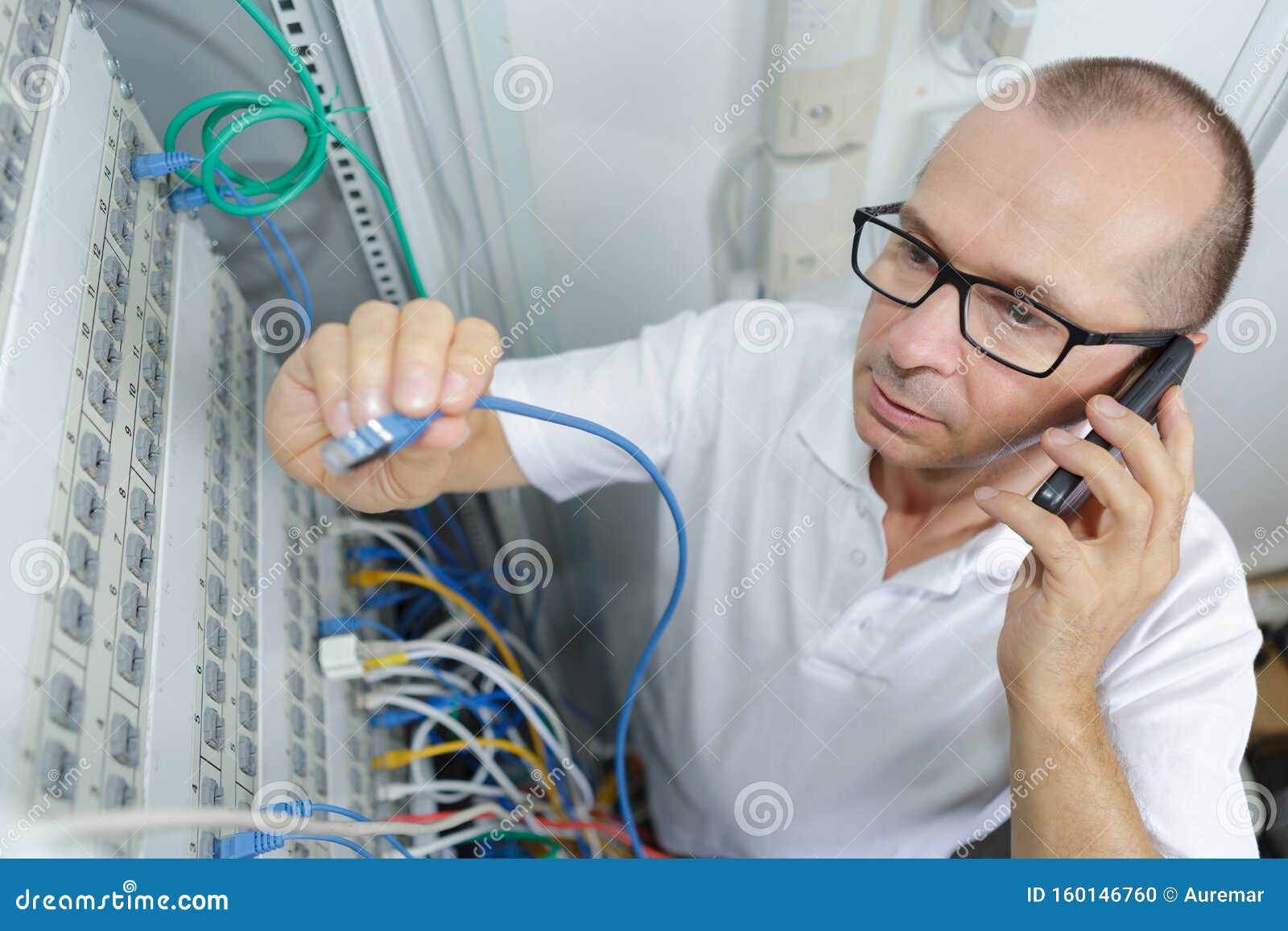Man Holding Electrical Cable with Mobile Phone Asking for Help Stock ...