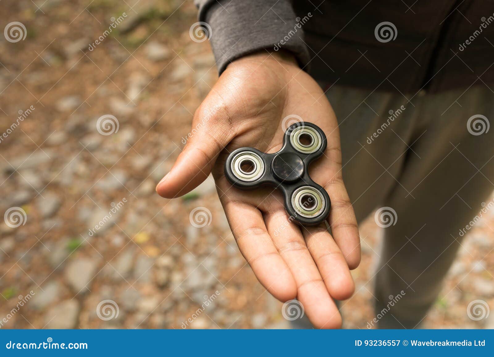 Man Holding a Fidget Spinner Stock Image - Image of innovation ...