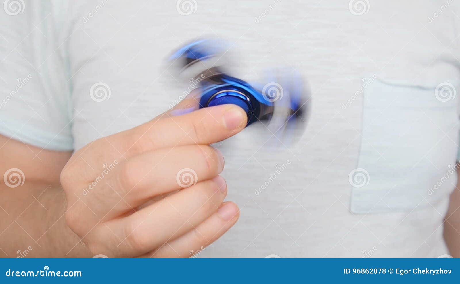 Man Holding a Fidget Spinner Stock Footage - Video of green, forkids ...