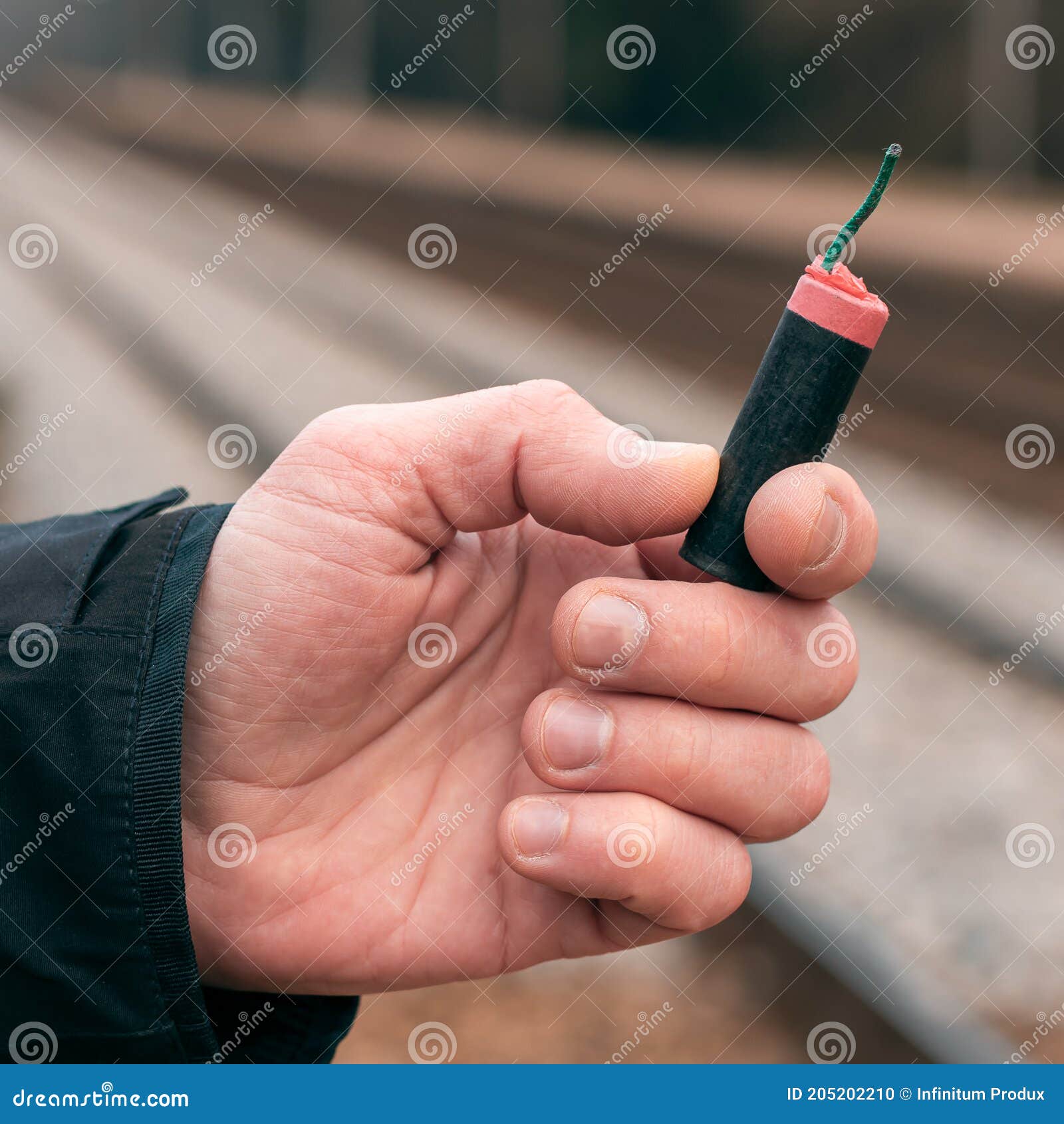 Man Holding a Firecracker in His Hand Stock Photo - Image of bang, bomb ...