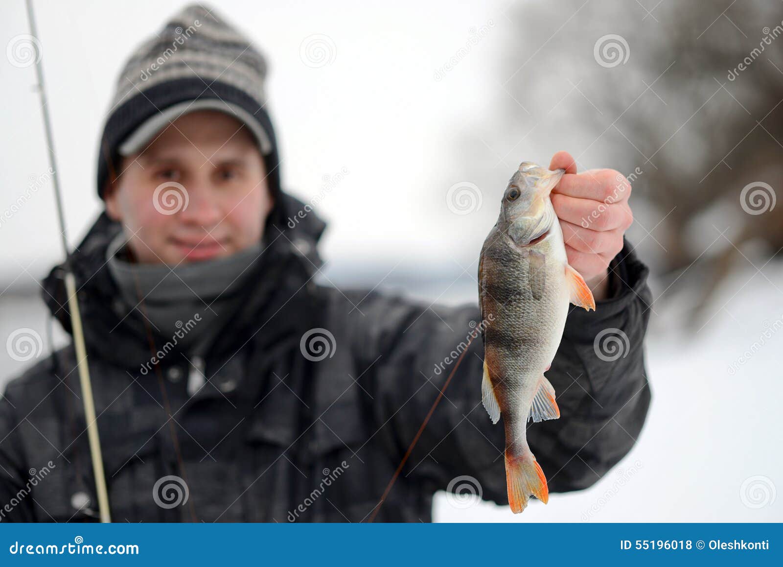 A Man Holding a Fish Caught Stock Photo - Image of animal, caught: 55196018