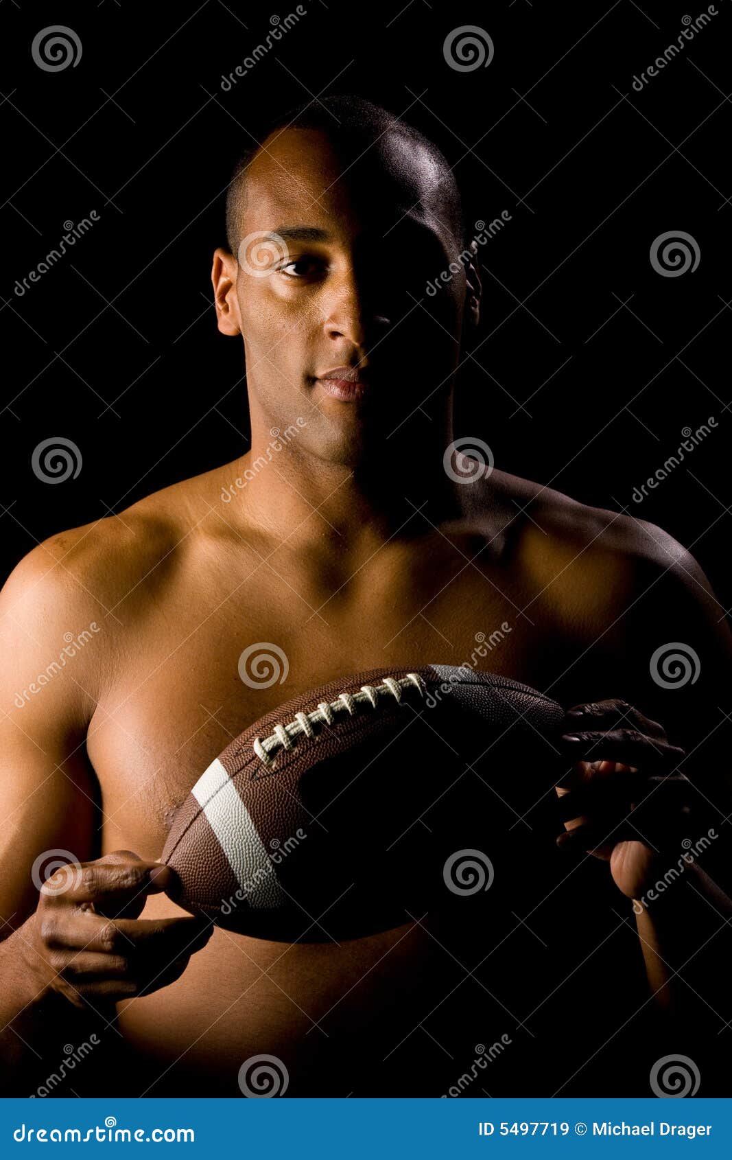 Man holding football stock image. Image of pensive, recreation - 5497719