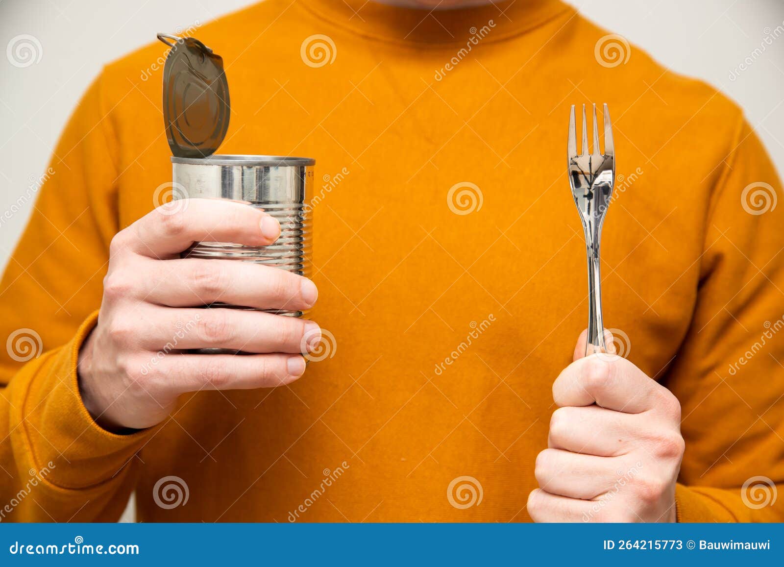 Man Holding a Fork and Opened Tin Can Stock Image - Image of metal ...