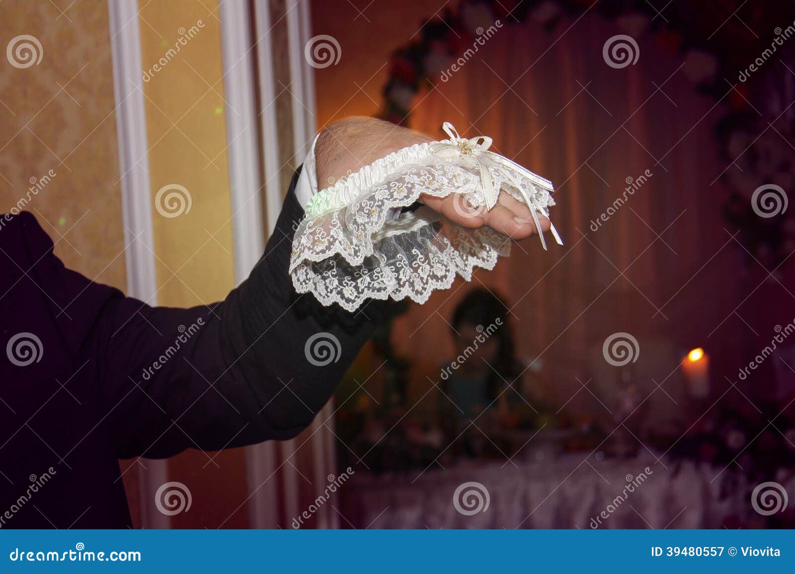Man holding a garter belt stock image. Image of holds - 39480557