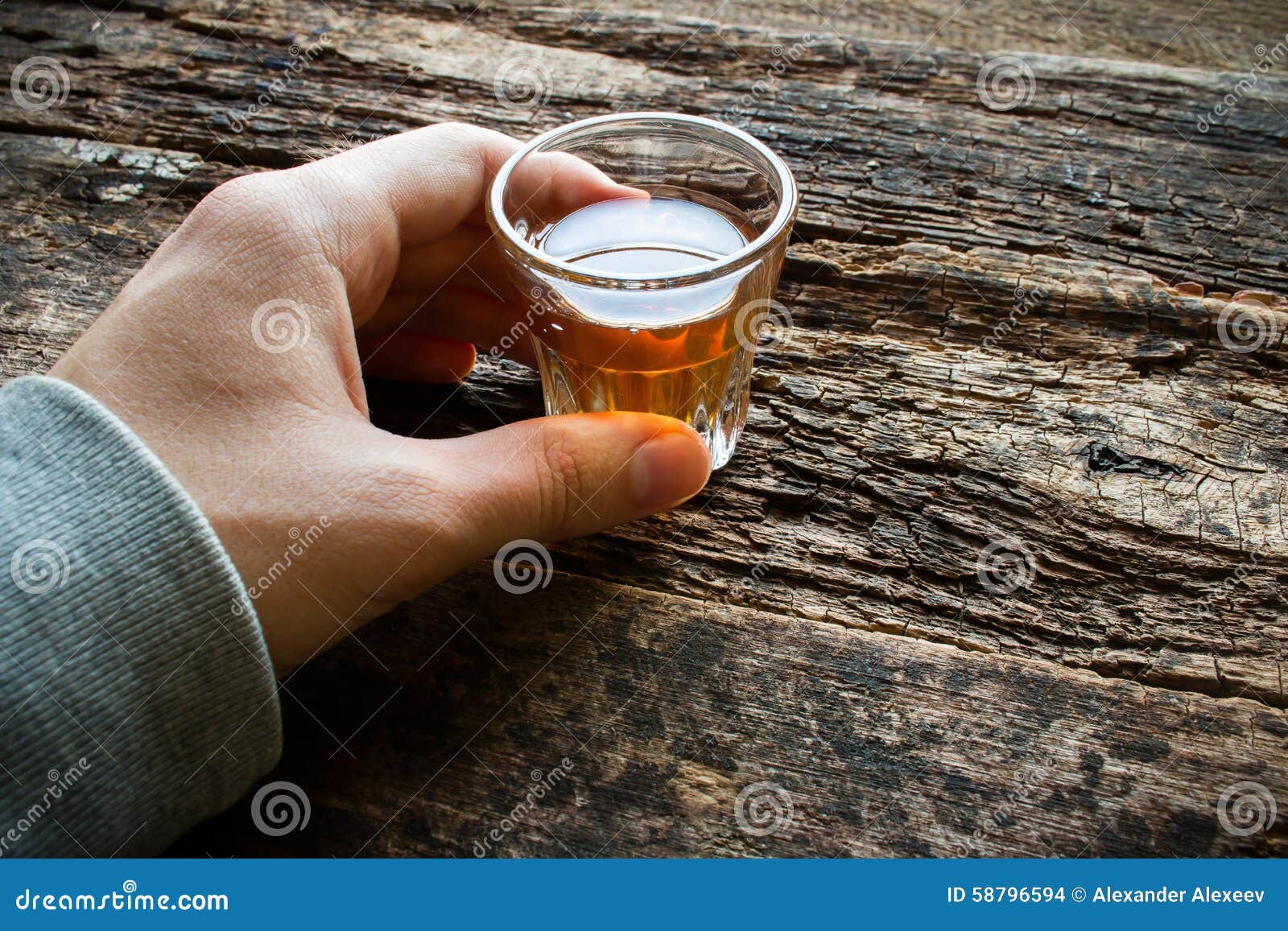 Man Holding a Glass of Alcohol on Table Stock Photo - Image of disease ...