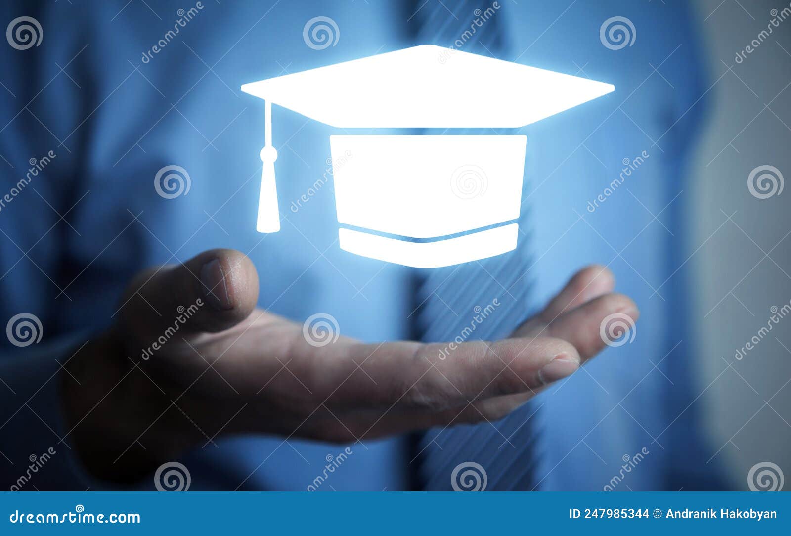 Man Holding Graduation Cap Symbol. Education Stock Photo - Image of ...