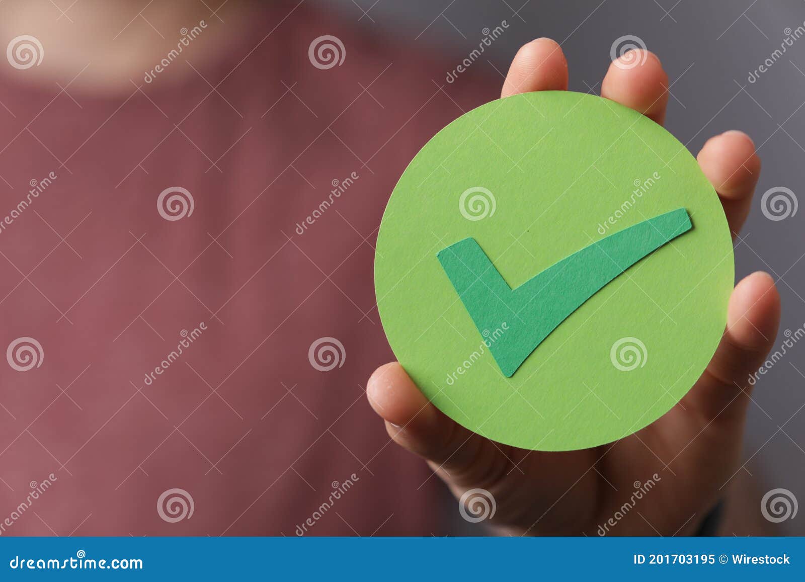 Man Holding a Green Check Mark Stock Image - Image of symbol, green ...