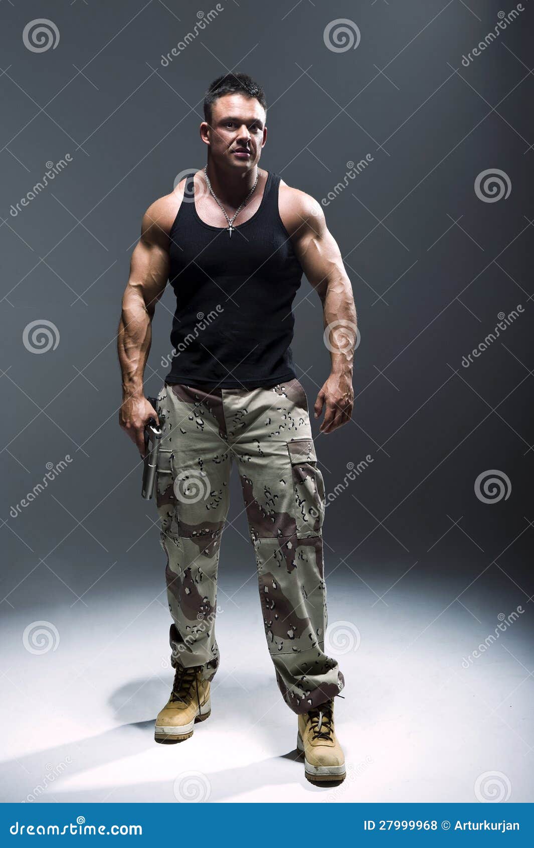 Man holding gun stock photo. Image of brawny, chest, danger - 27999968