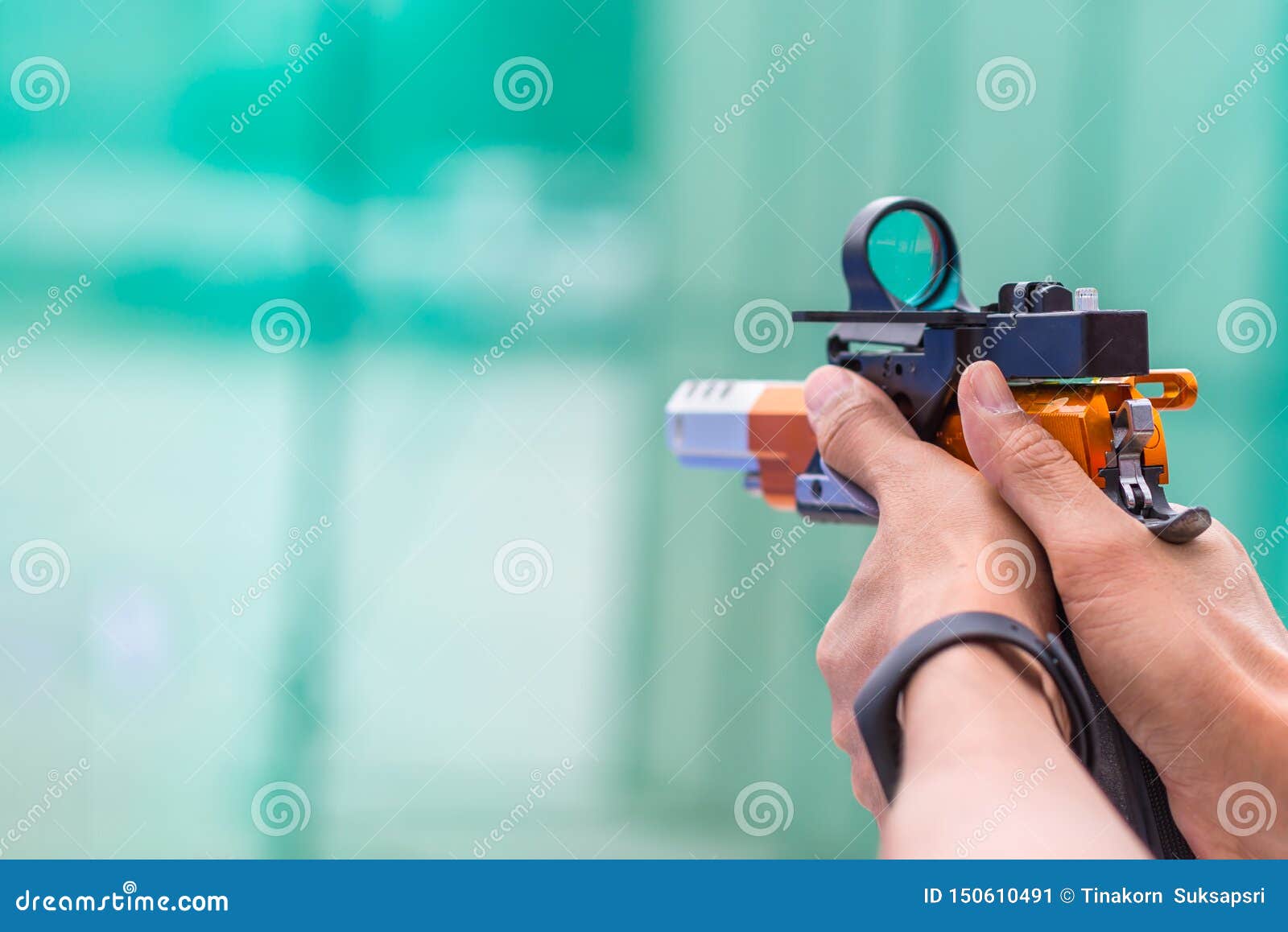 Man Holding Gun Ready To Shoot for Protect and Security Stock Image ...