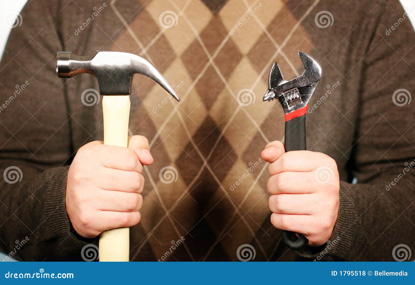 Man Holding Hammer and Wrench Stock Photo - Image of holding, hands ...