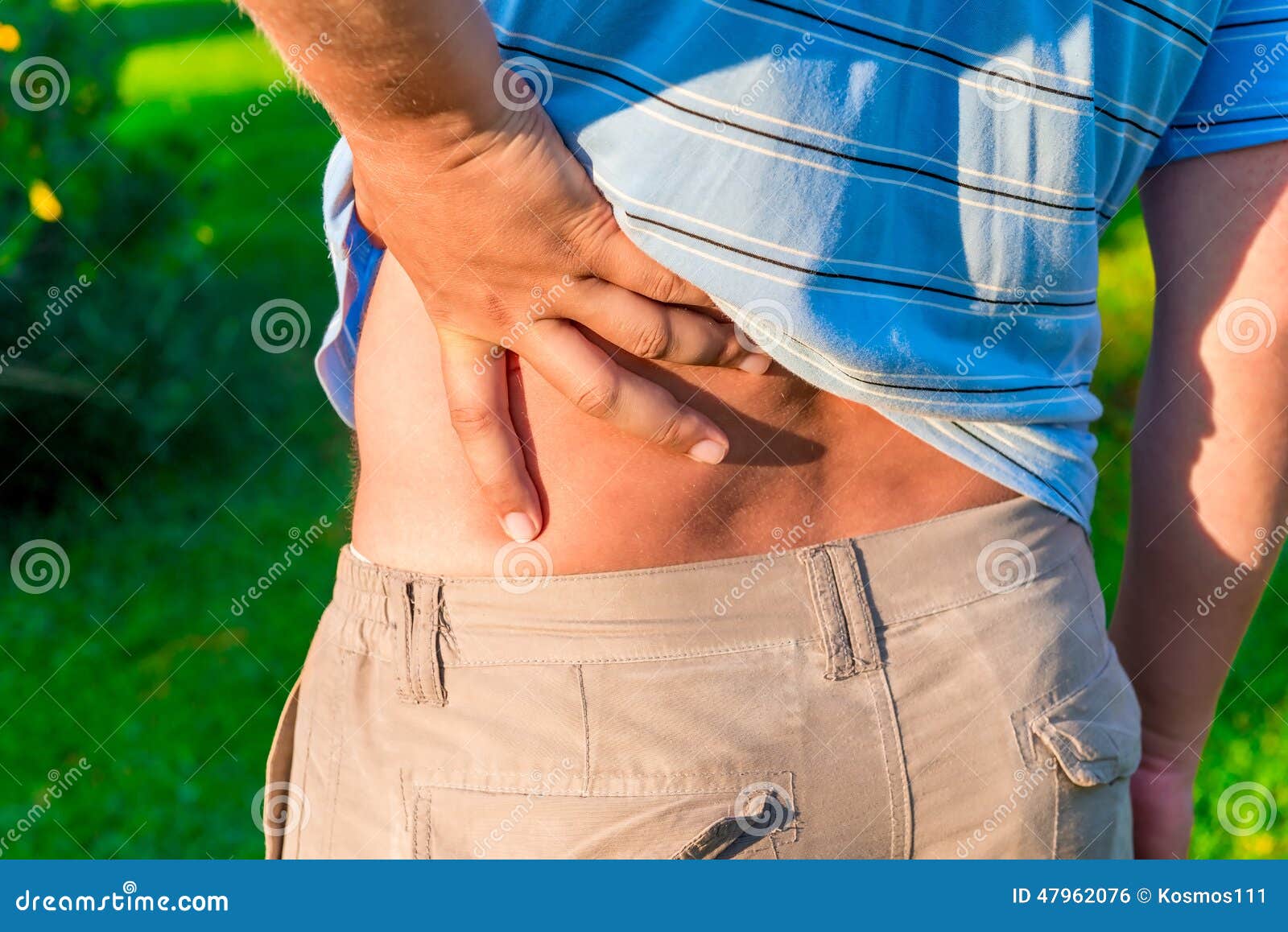 Man Holding Hand Sore Lower Back Stock Photo - Image of build, healthy ...