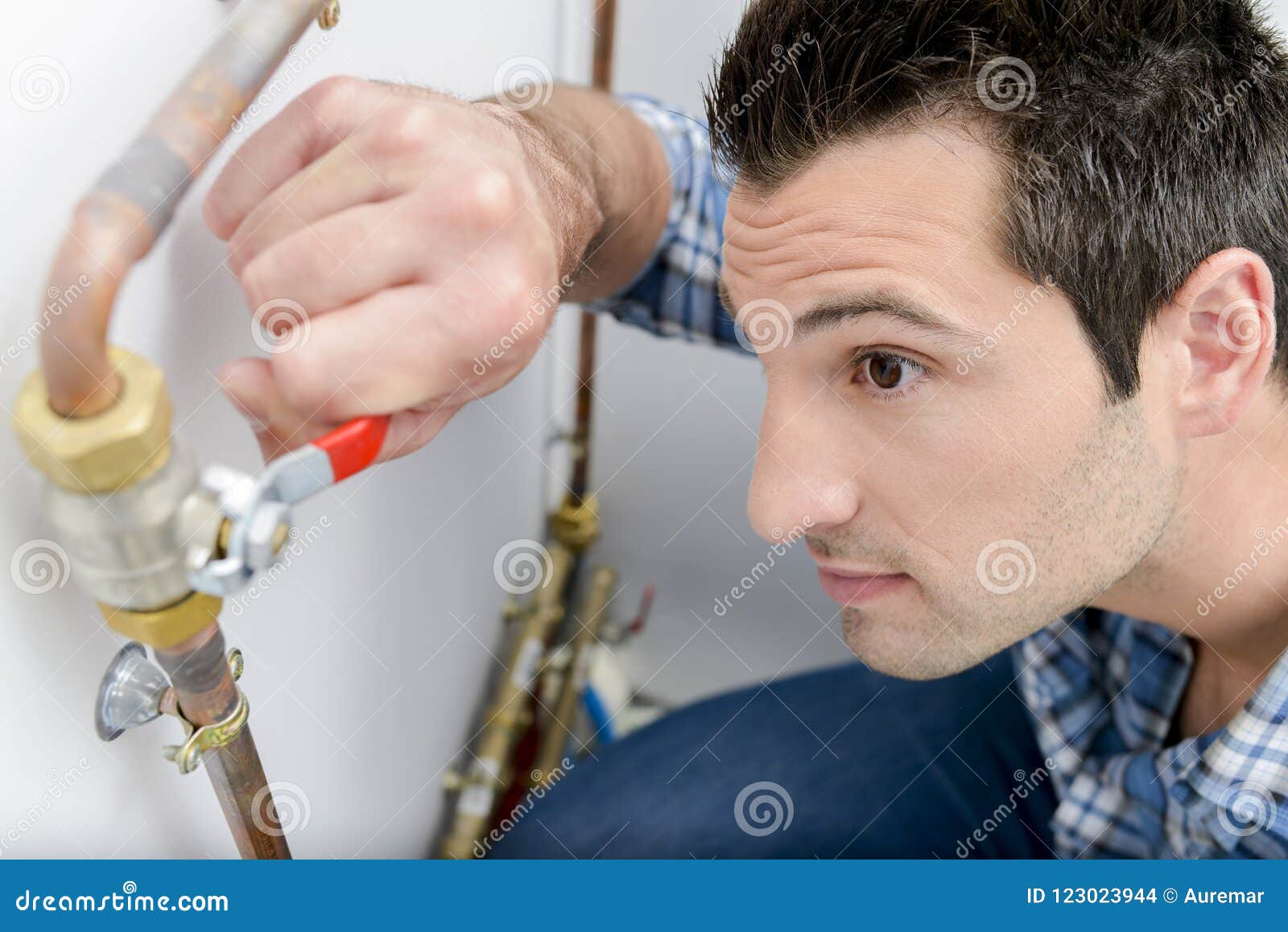 Man Holding Handle on Copper Pipe Stock Photo - Image of handle, open ...