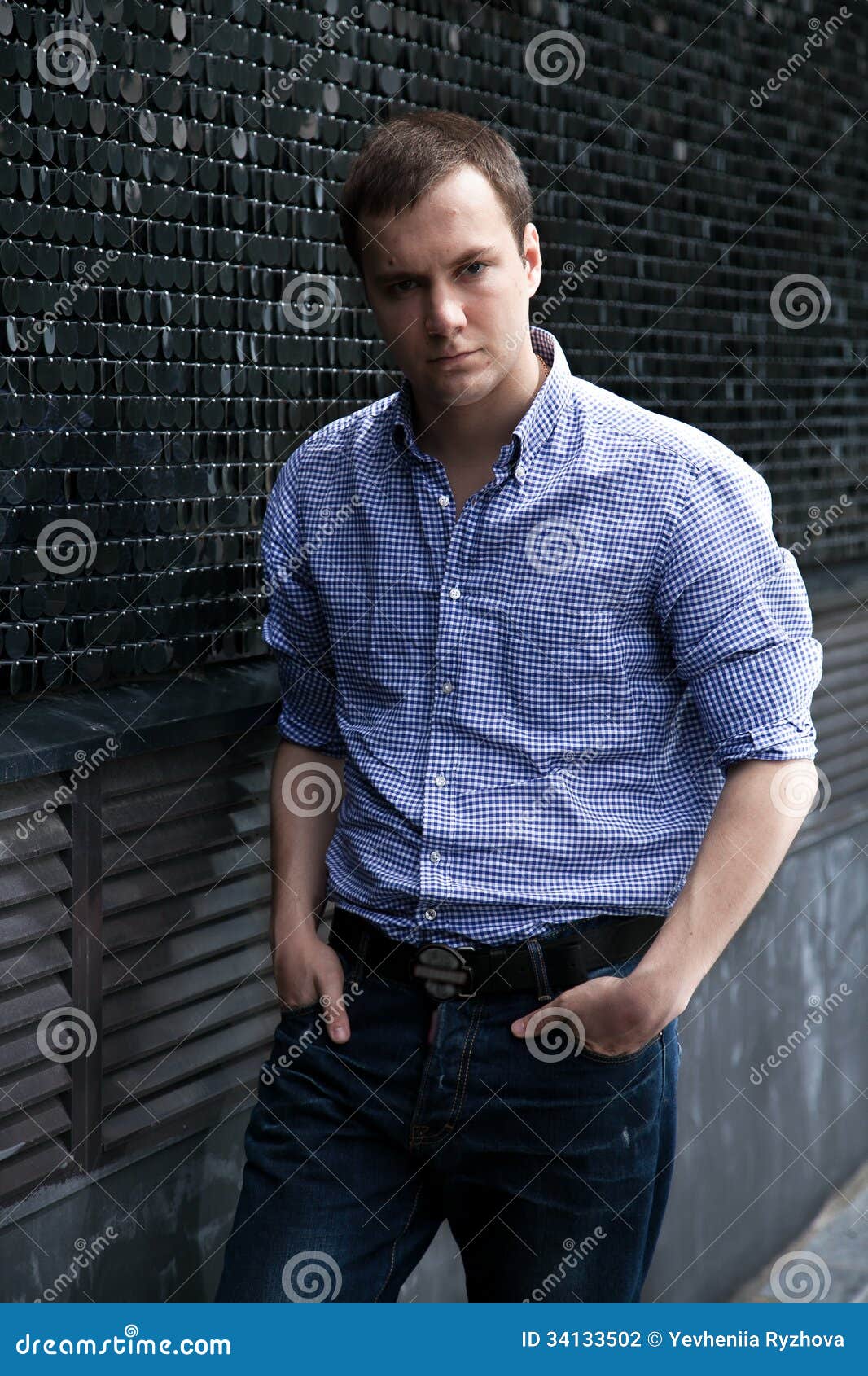 Man Holding Hands in Pockets Stock Photo - Image of male, model: 34133502