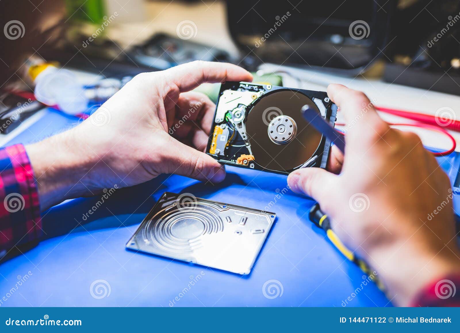 Man holding a hard disc stock photo. Image of memory - 144471122