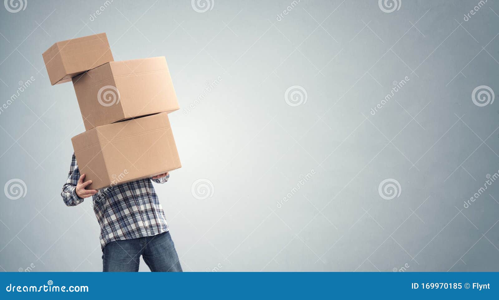 Man Holding Heavy Cardboard Boxes Relocation, Moving House Or Courier ...