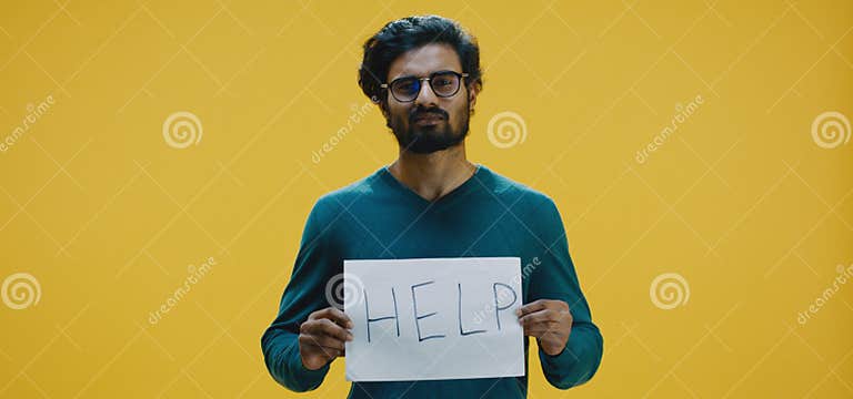 Man holding help sign stock image. Image of appeal, begging - 169536793